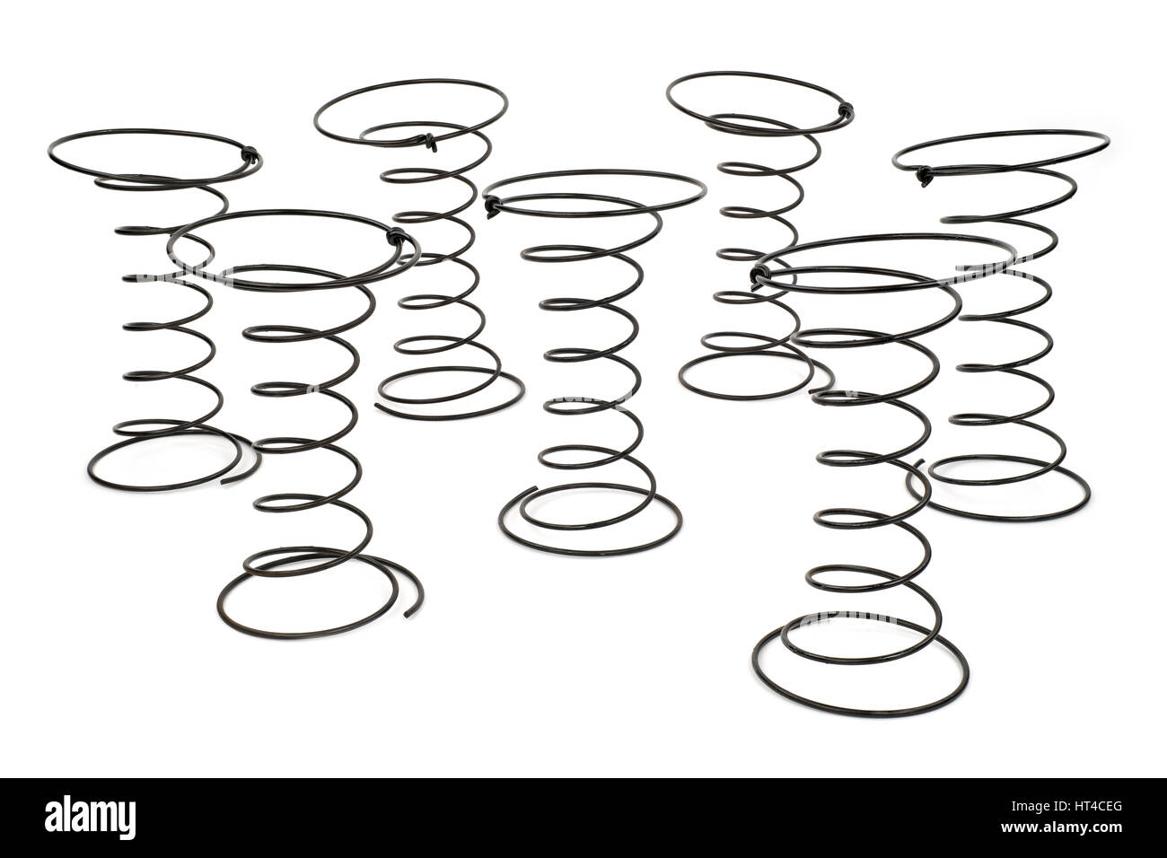 Seven Black Wire Springs used in Upholstery on white background Stock ...