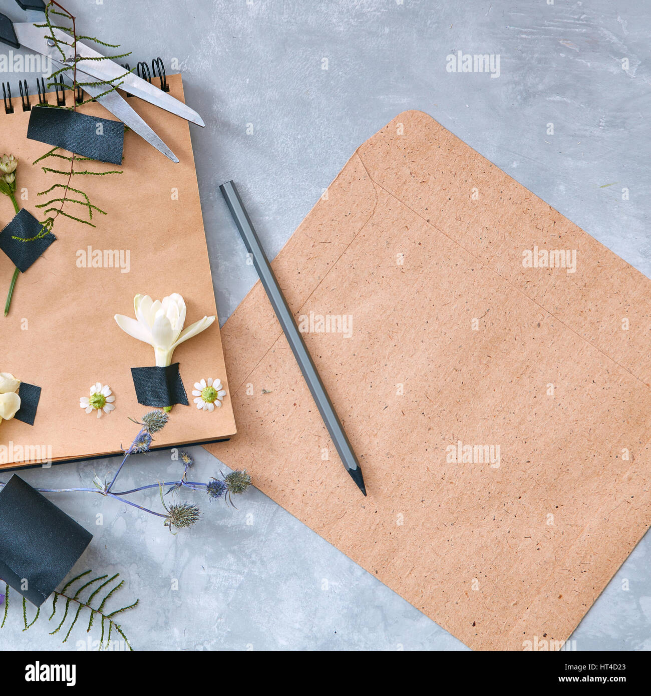 Notebook with pencil Stock Photo - Alamy