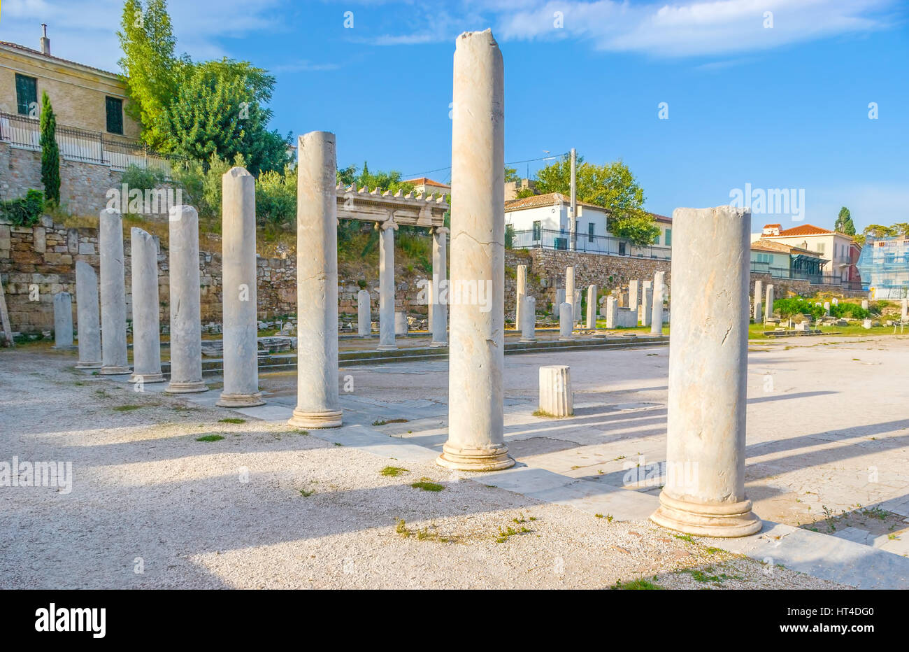 Rows of ruins of marble columns are the remains of ancient city of ...
