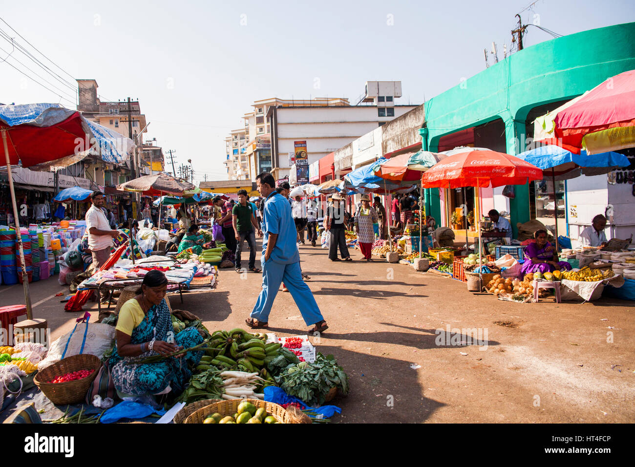 Farmers selling their goods at the Mapusa Market in North Goa, India ...