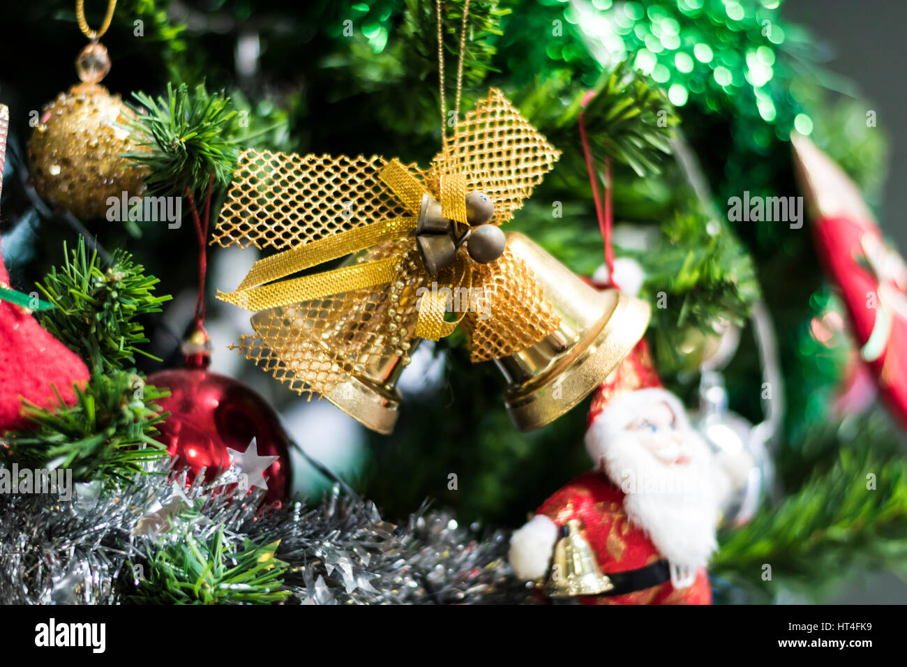 Jingle bell and hanging on a Chrismas tree Stock Photo - Alamy