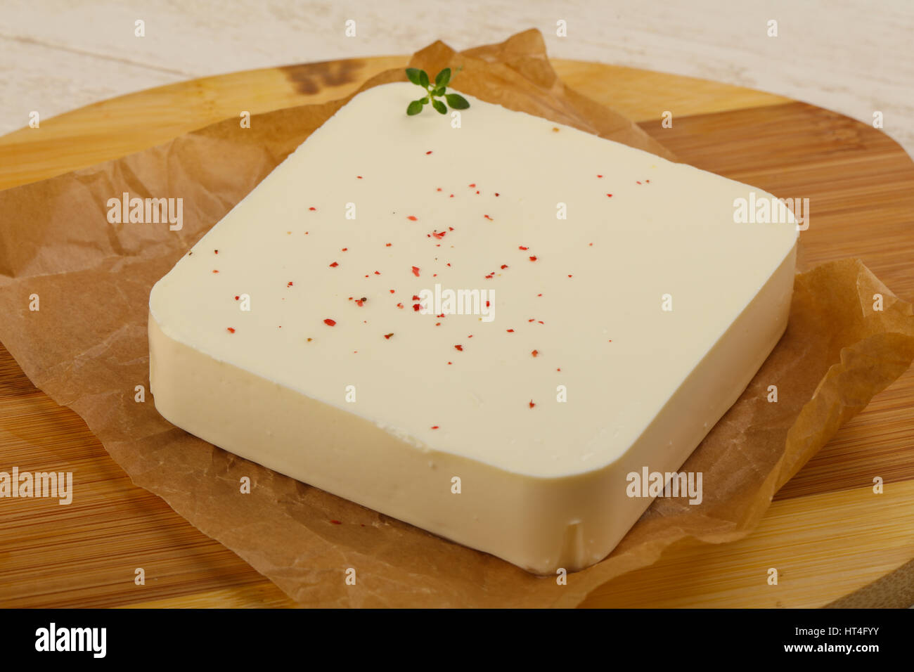 Traditional Feta cheese on the wooden background Stock Photo - Alamy