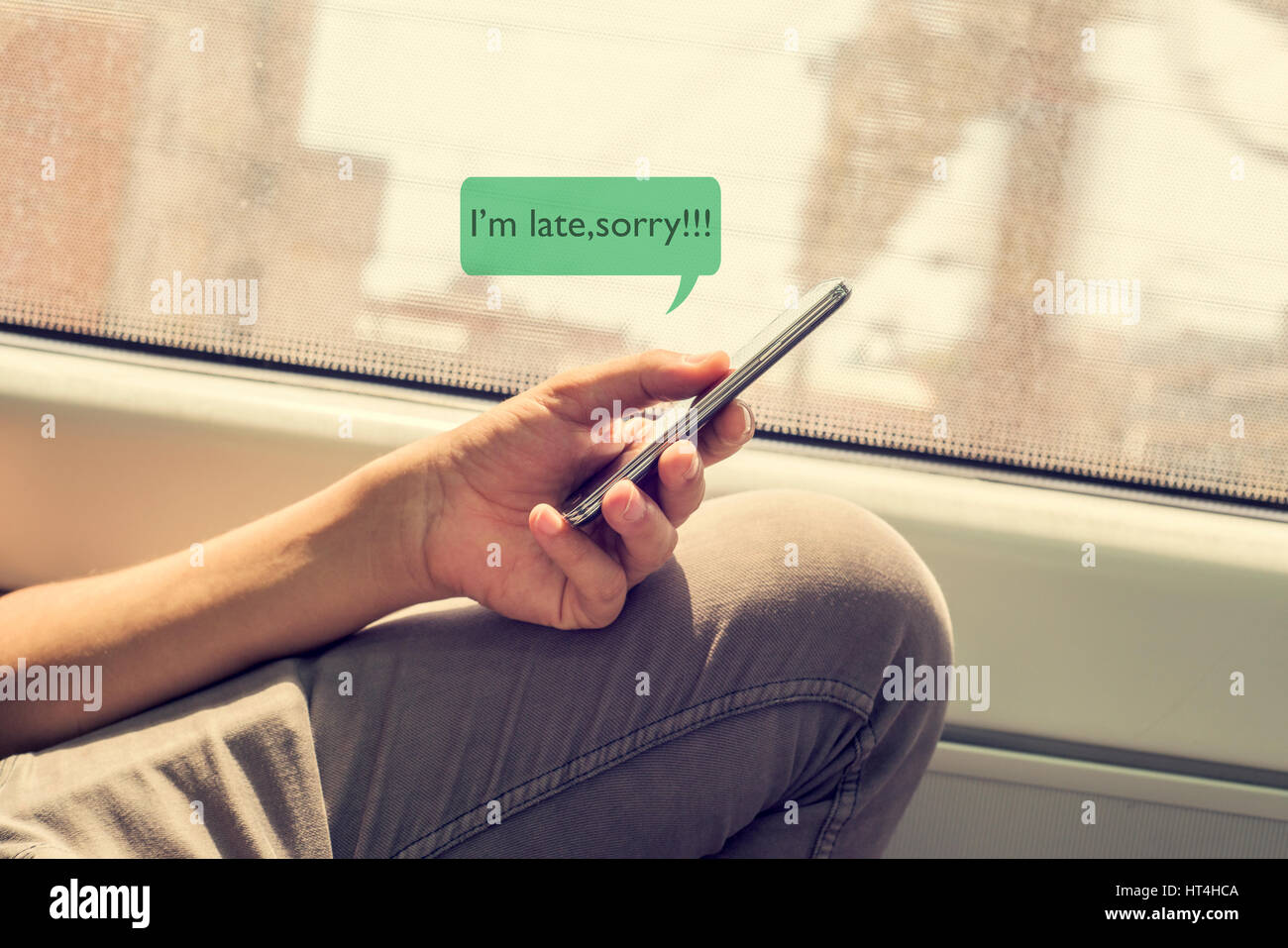 closeup of a young caucasian man writing a text message with his ...