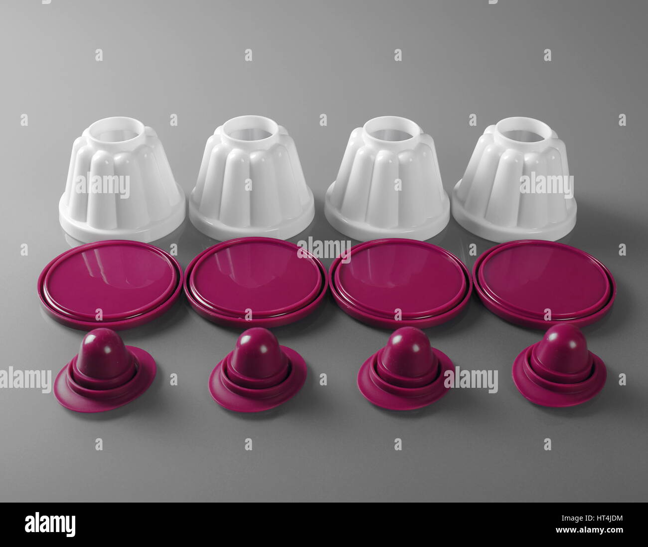 Set of four colorful pudding molds Stock Photo - Alamy