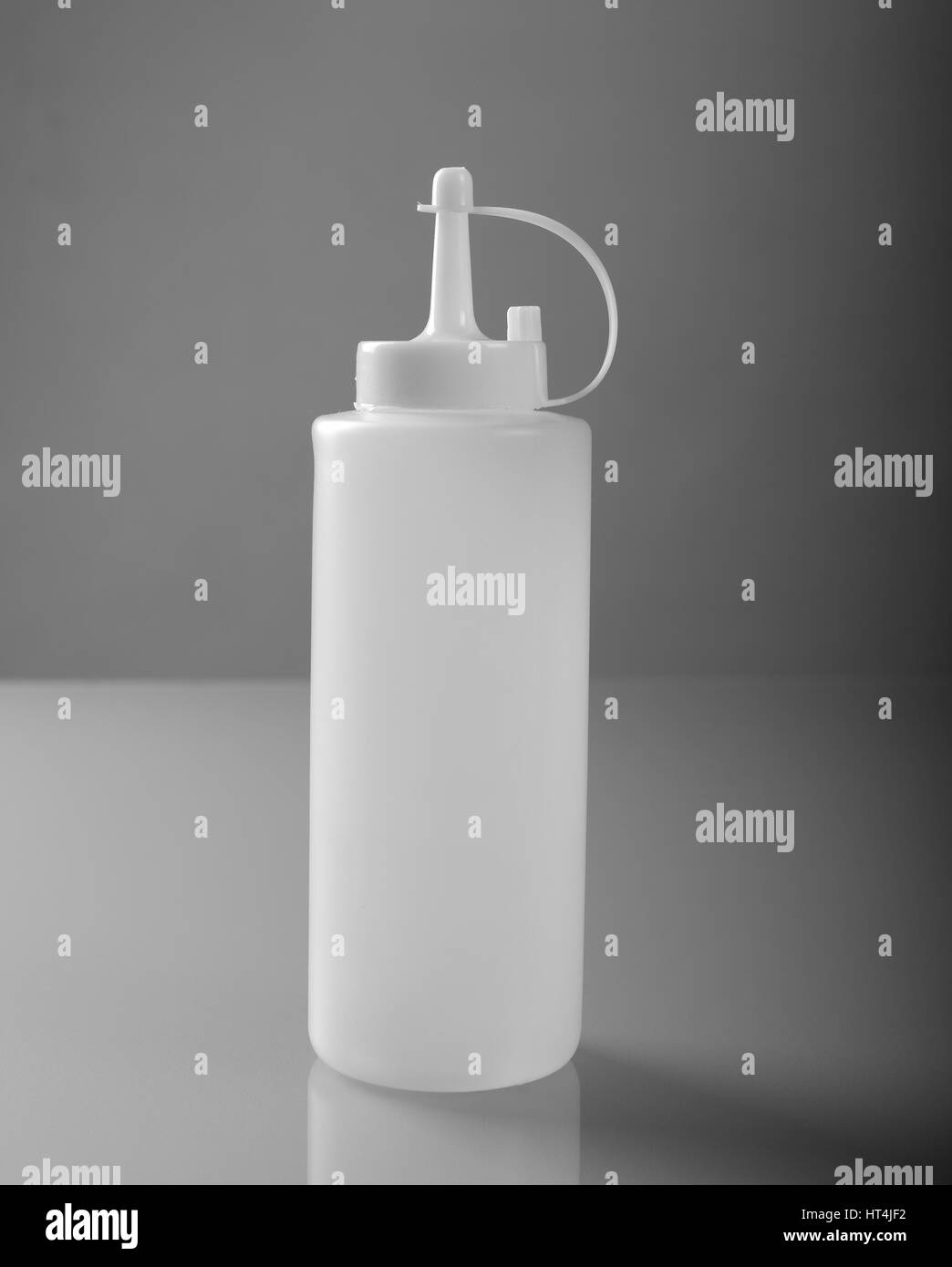 White plastic sos bottle with cap, front view Stock Photo - Alamy