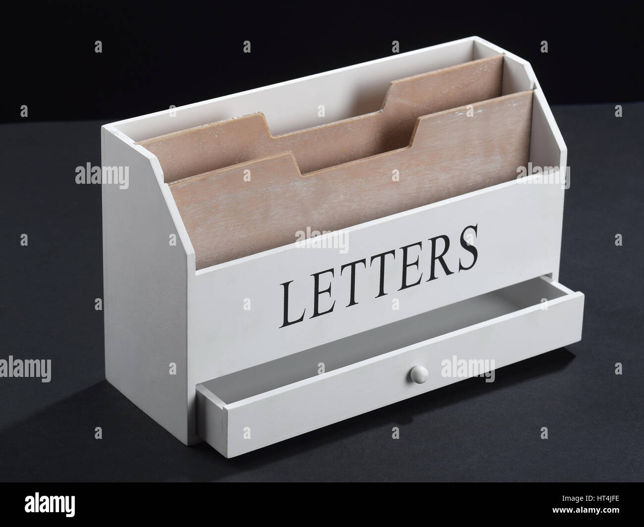 White wooden holder for letters Stock Photo - Alamy