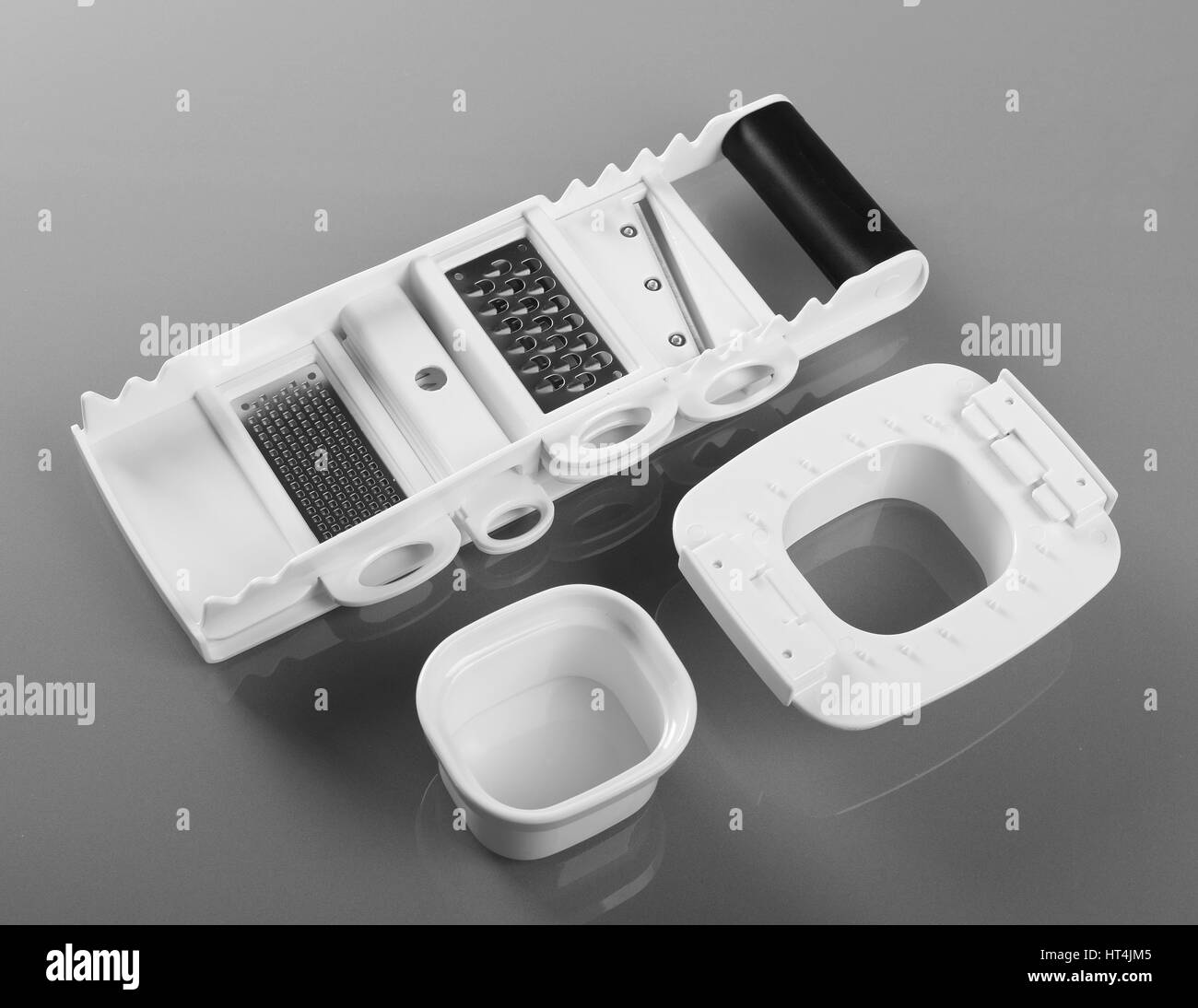 Universal grater with different stainless blades Stock Photo - Alamy