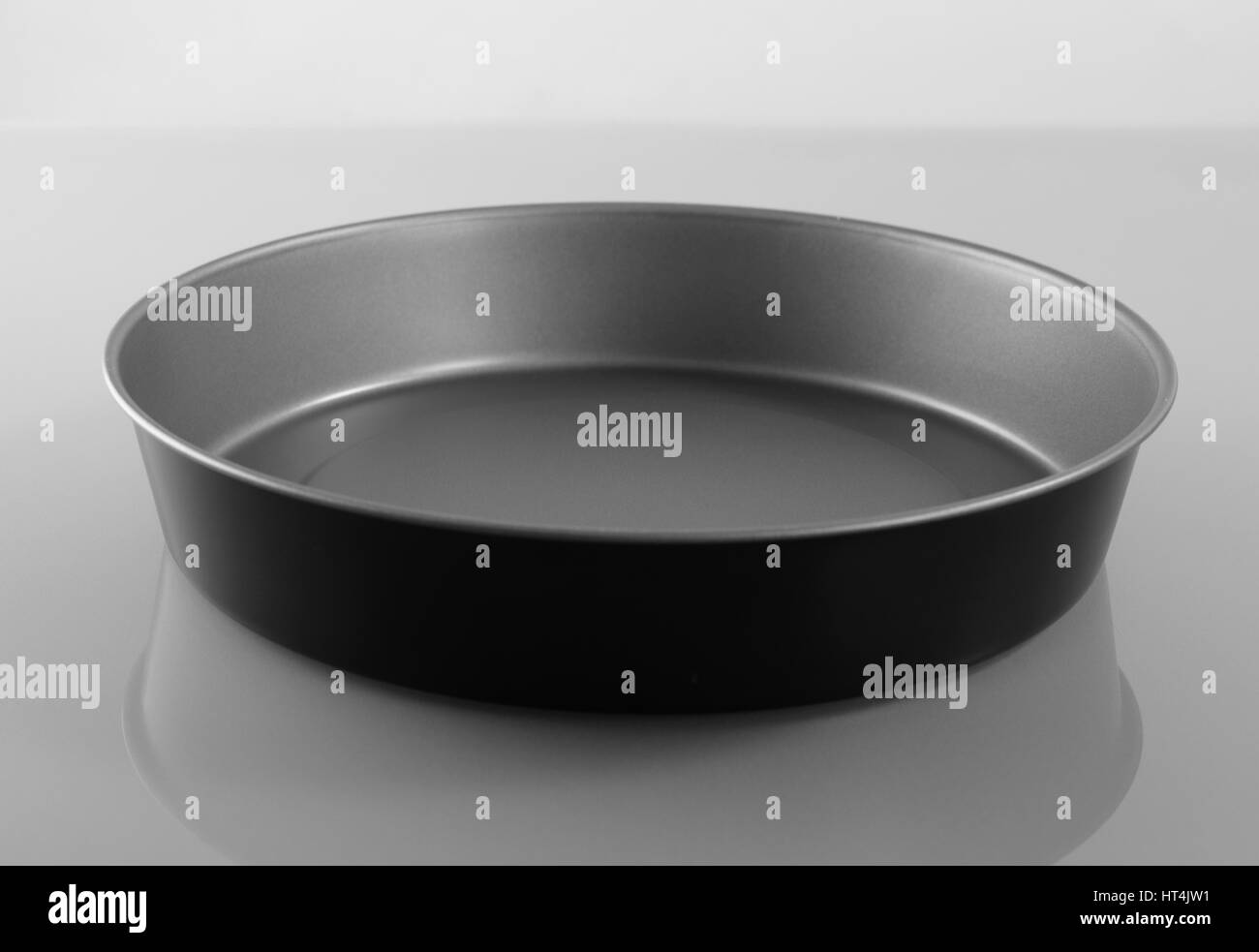 Teflon baking dish cakes, isolated on white background Stock Photo - Alamy