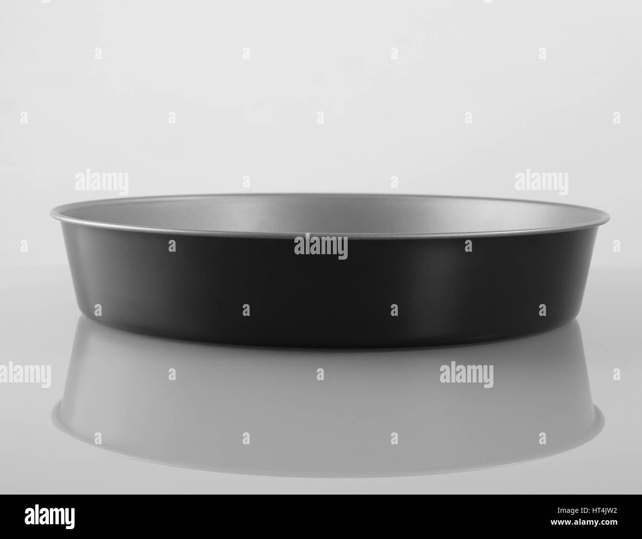 Teflon baking dish cakes, isolated on white background Stock Photo - Alamy