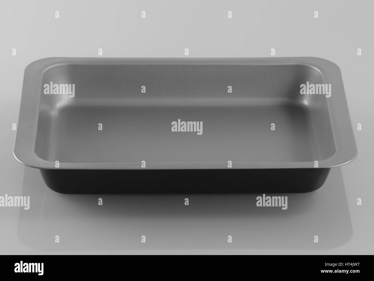 Teflon baking dish cakes, isolated on white background Stock Photo - Alamy