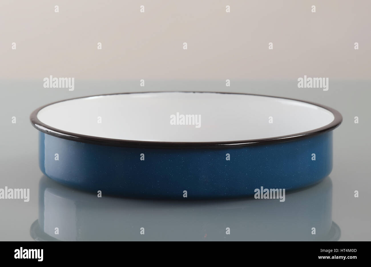 Enameled round pan, front view Stock Photo - Alamy