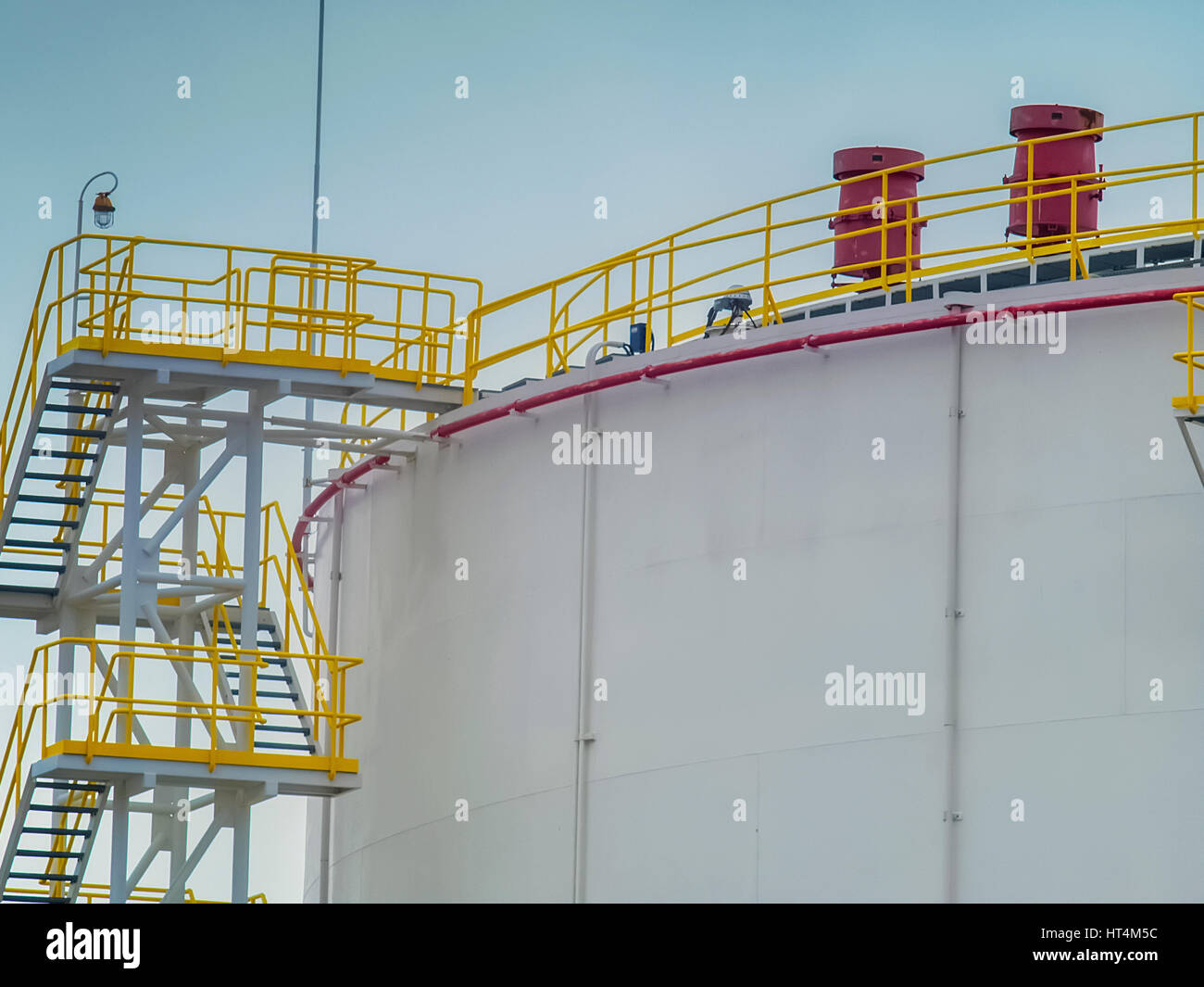 The large fuel tank with the ladder Stock Photo - Alamy
