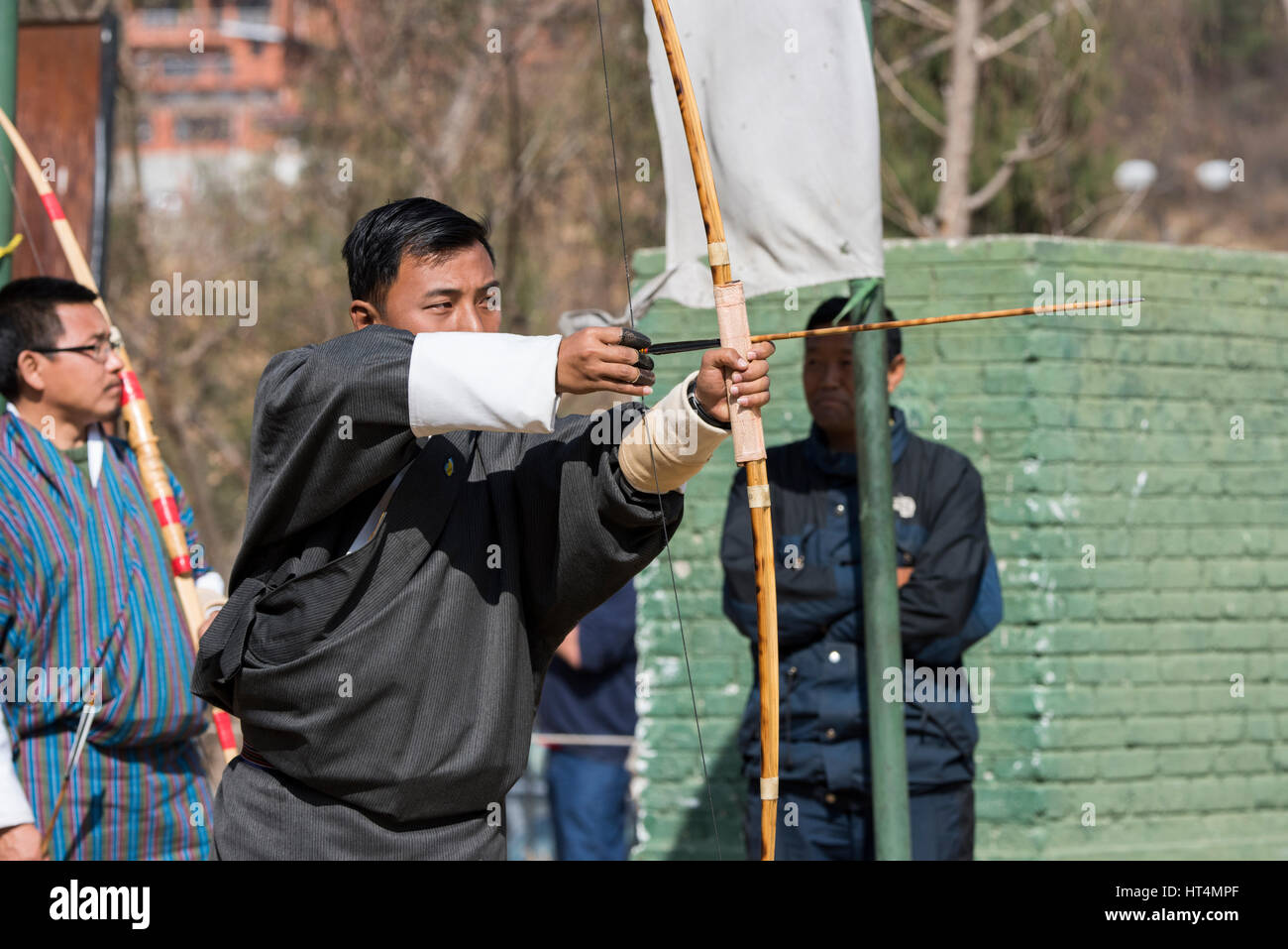 Bhutan, Thimphu. Capital of Bhutan. Local archery competition played in ...
