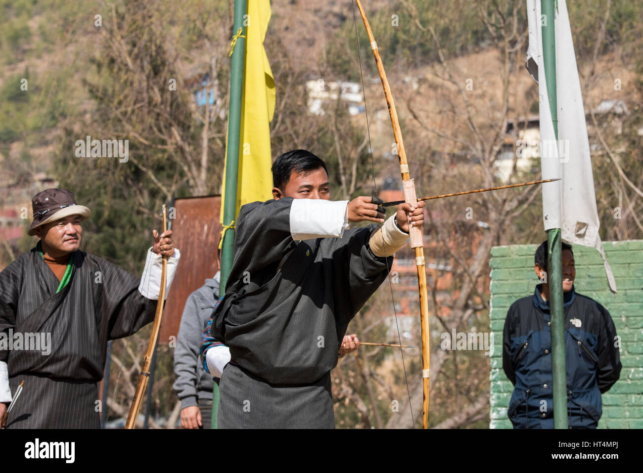 Bhutan, Thimphu. Capital of Bhutan. Local archery competition played in ...
