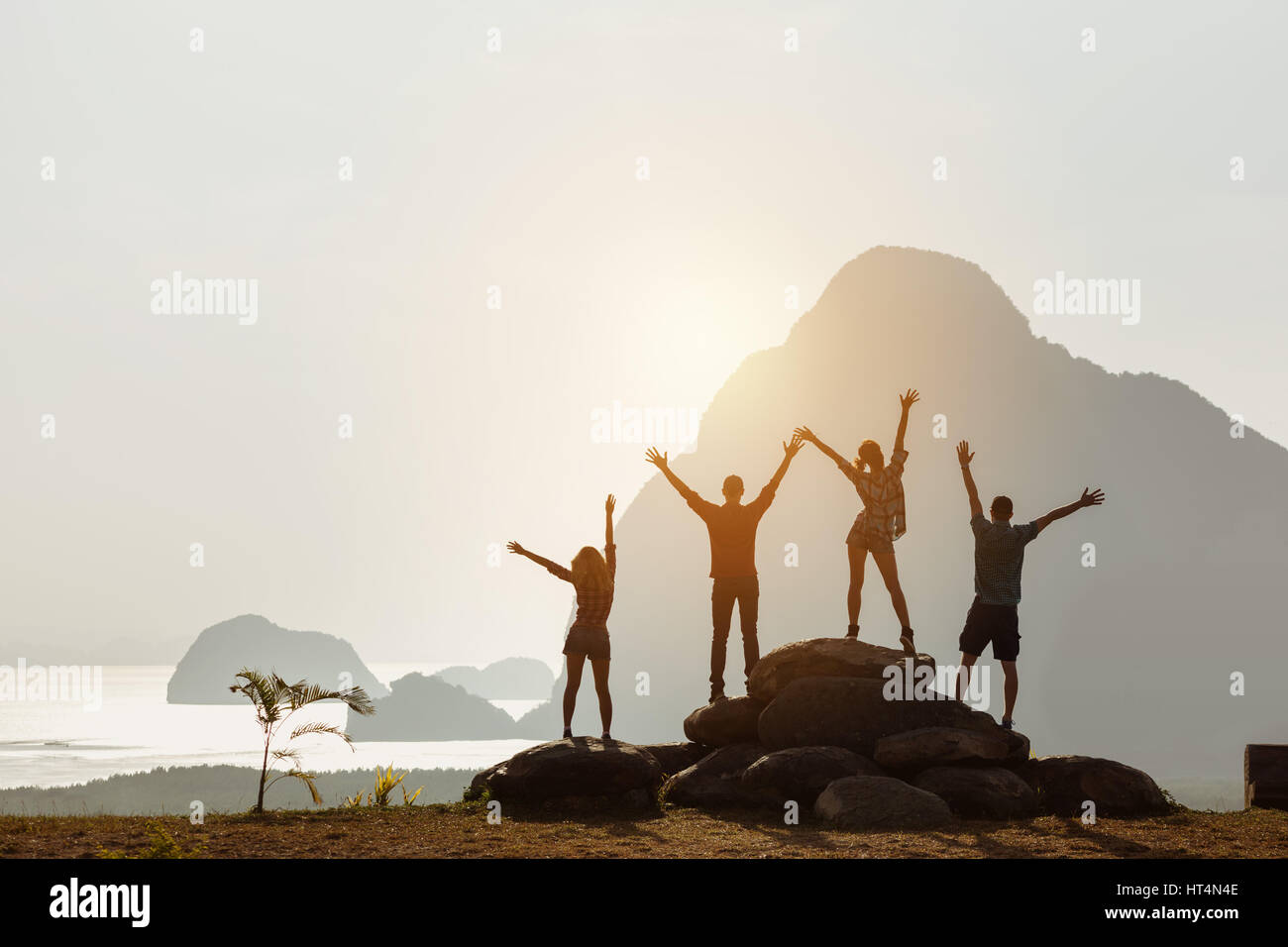 Group people winner concept top mountain Stock Photo - Alamy