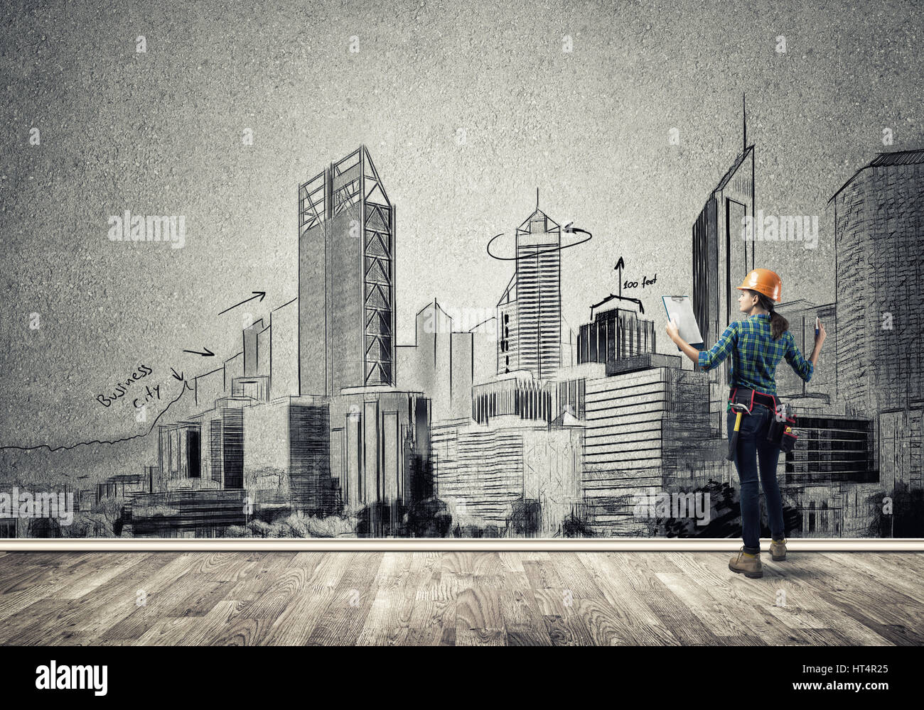 Back view of engineer woman with folder and sketches of construction ...