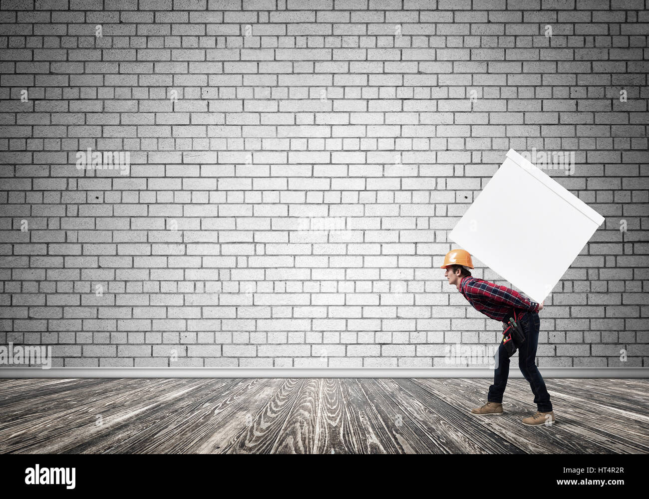 Man carrying on his back large box Stock Photo - Alamy