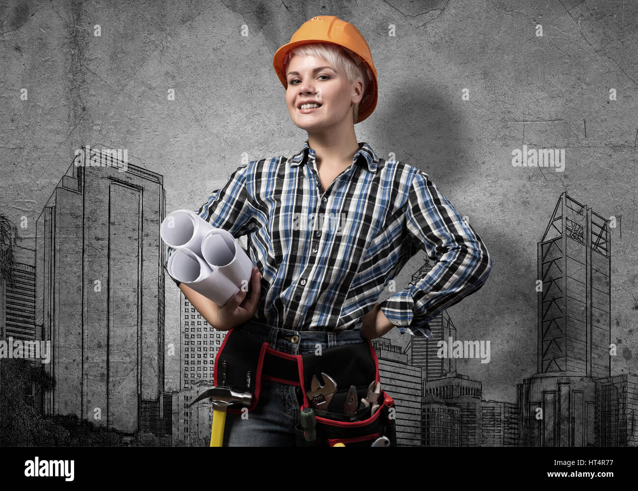 Engineer woman with blueprints and sketches of construction project on ...
