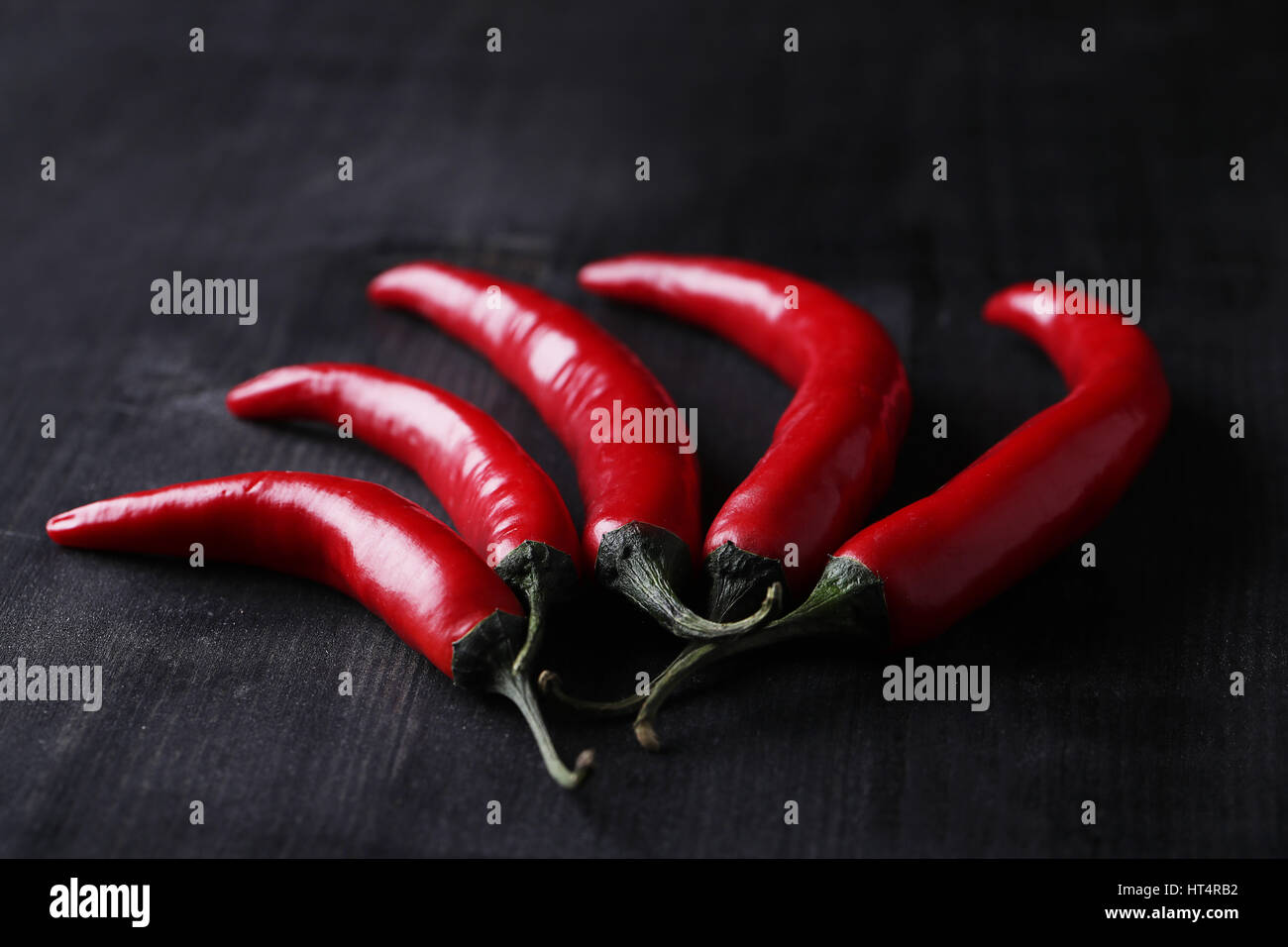Seasoning. Red chili pepper on the table Stock Photo - Alamy