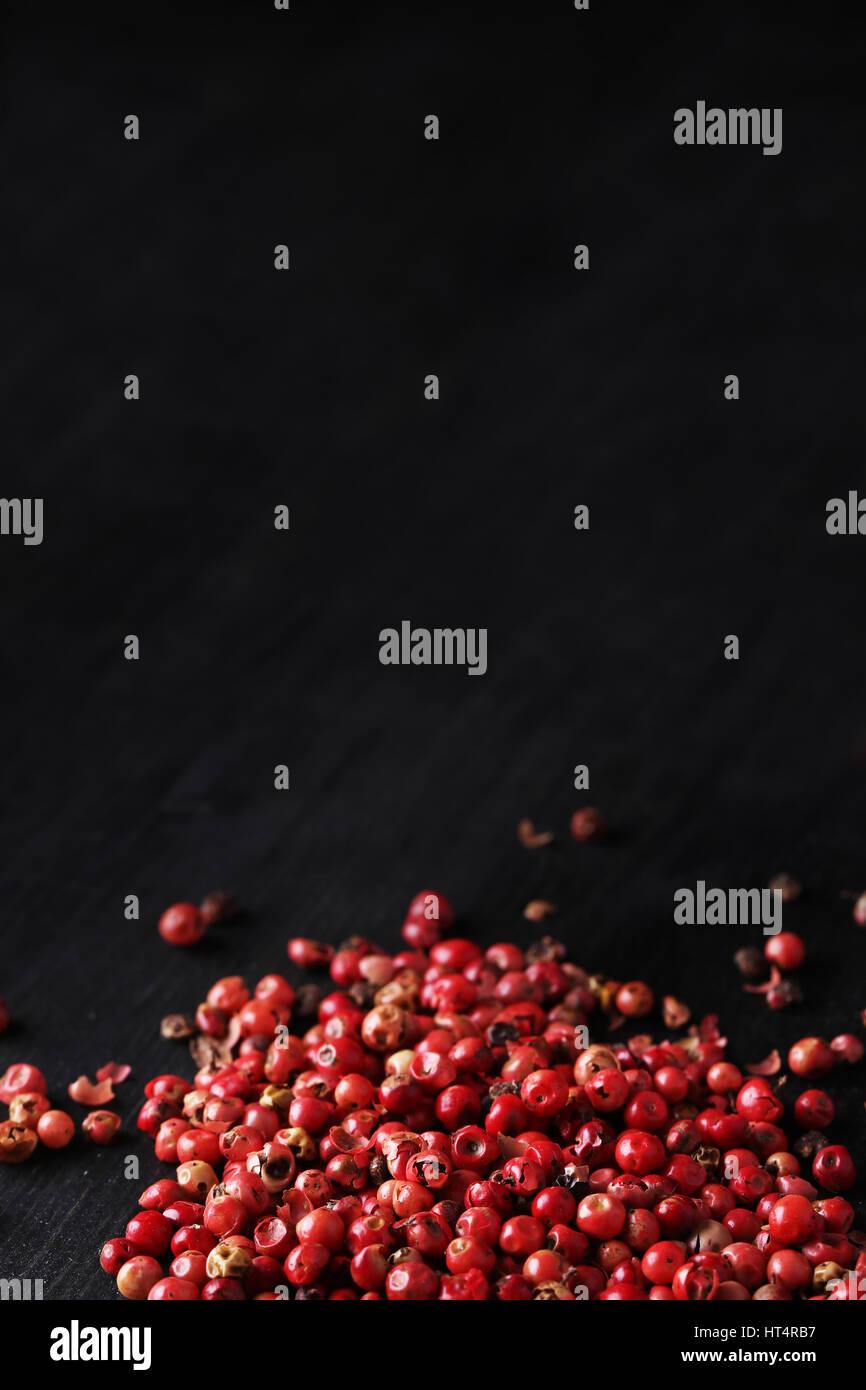Dried red peppercorn on the table Stock Photo - Alamy