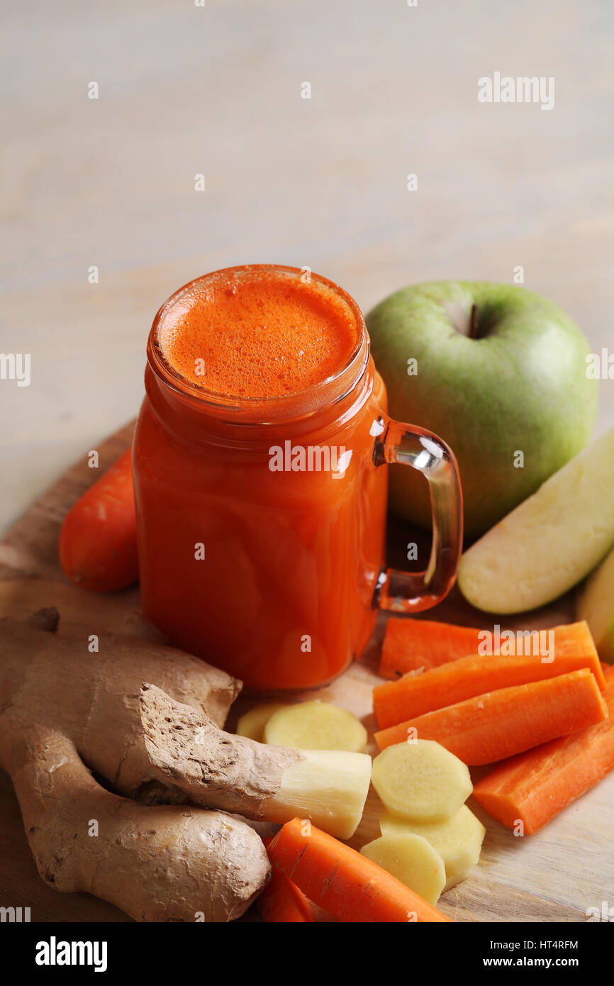 Drink. Healthy carrot juice on the table Stock Photo - Alamy