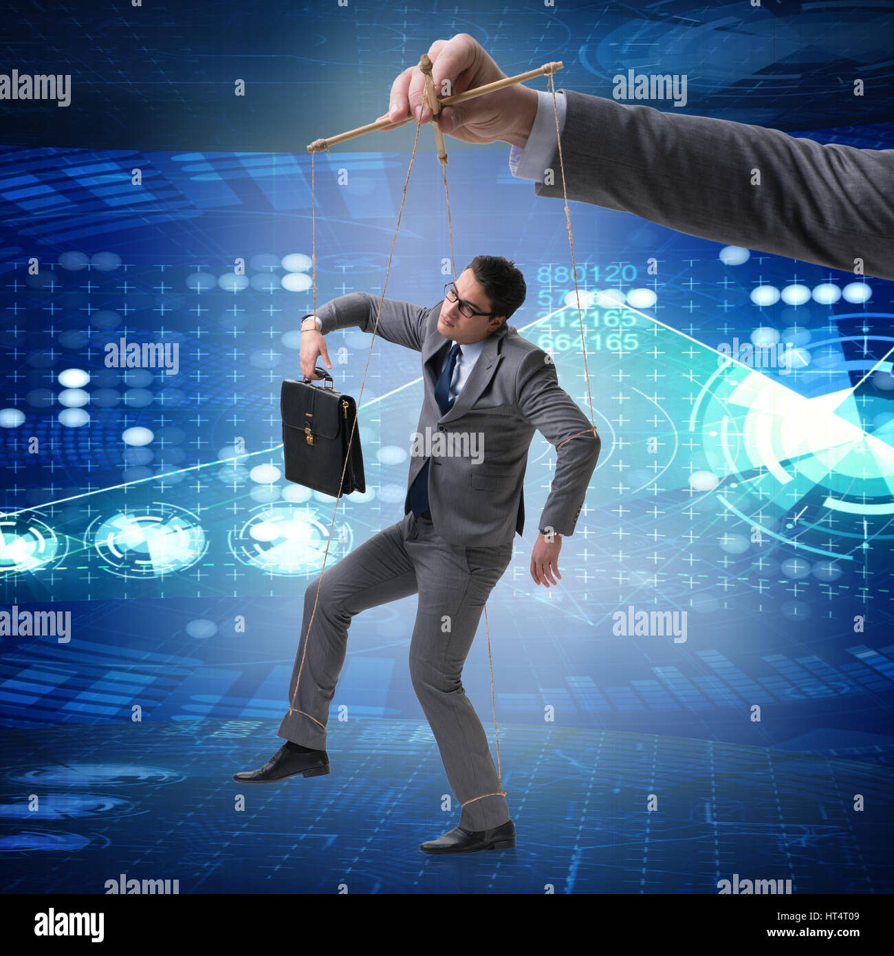 Businessman puppet being manipulated by boss Stock Photo - Alamy