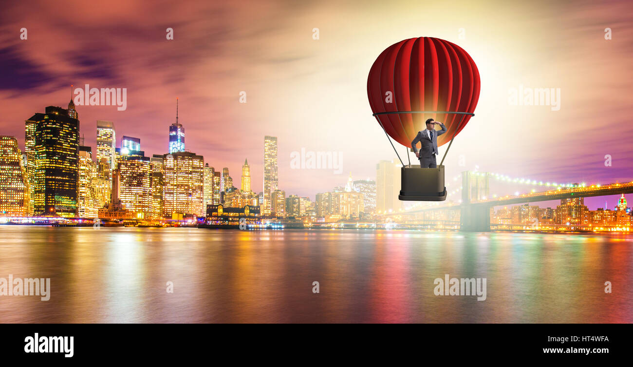 Businessman flying on balloon in challenge concept Stock Photo - Alamy