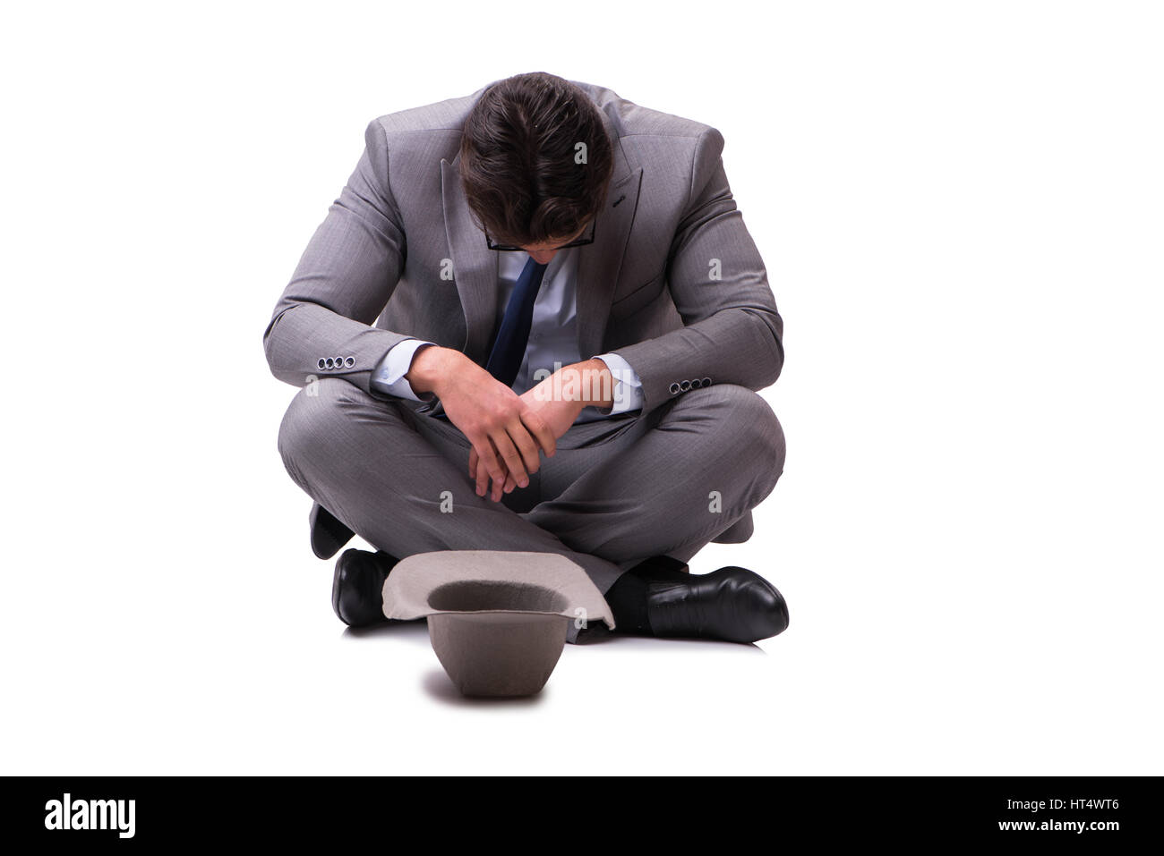 Bankrupt businessman isolated on white background Stock Photo - Alamy