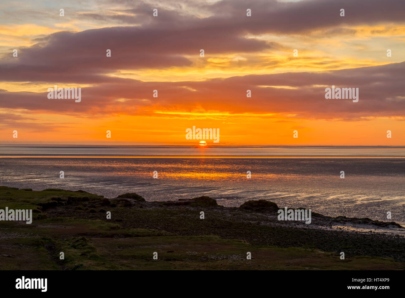 View over bay at sunset. Silverdale, Morecambe Bay, Lancashire, England ...
