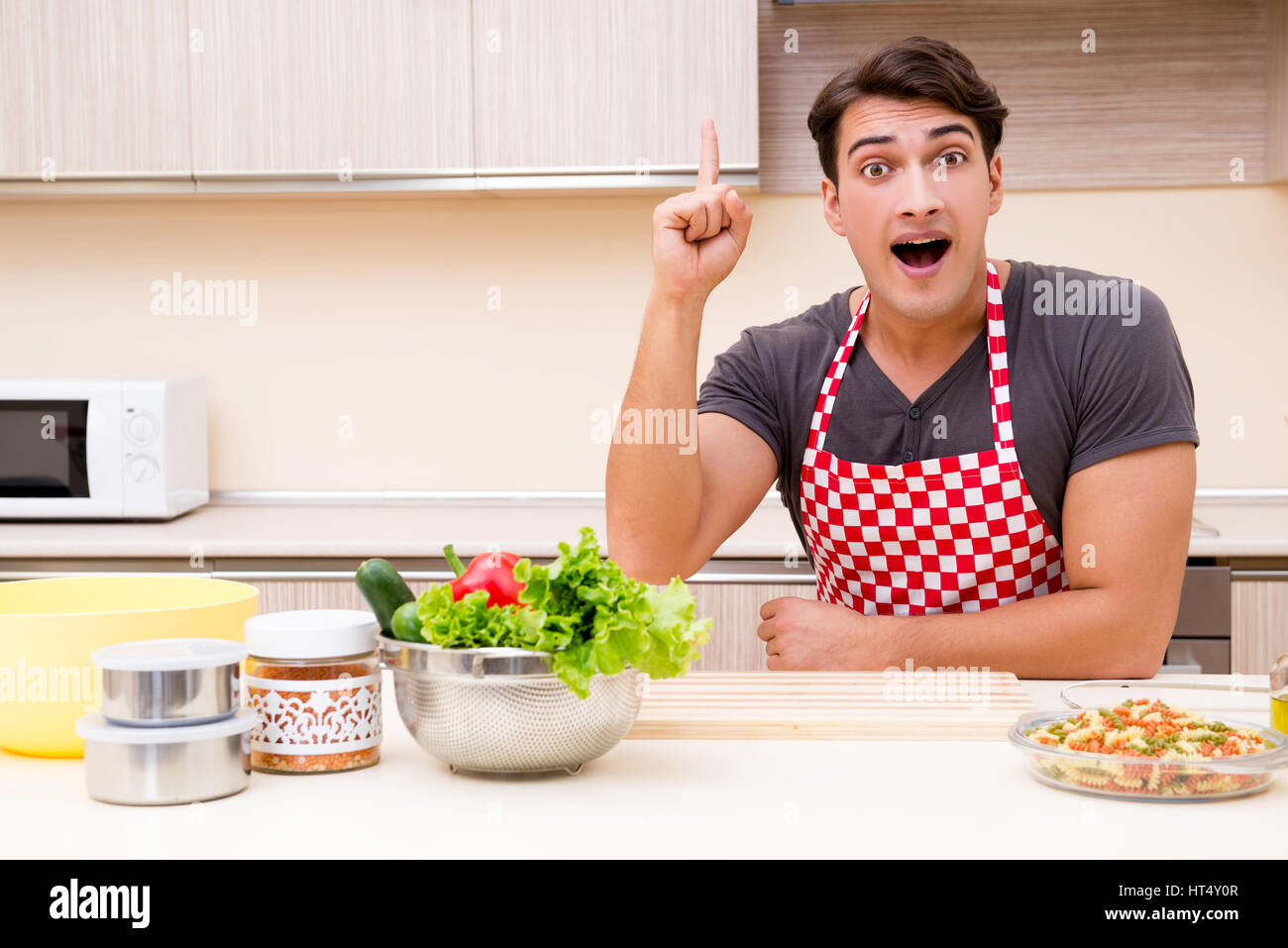 Man male cook preparing food in kitchen Stock Photo - Alamy