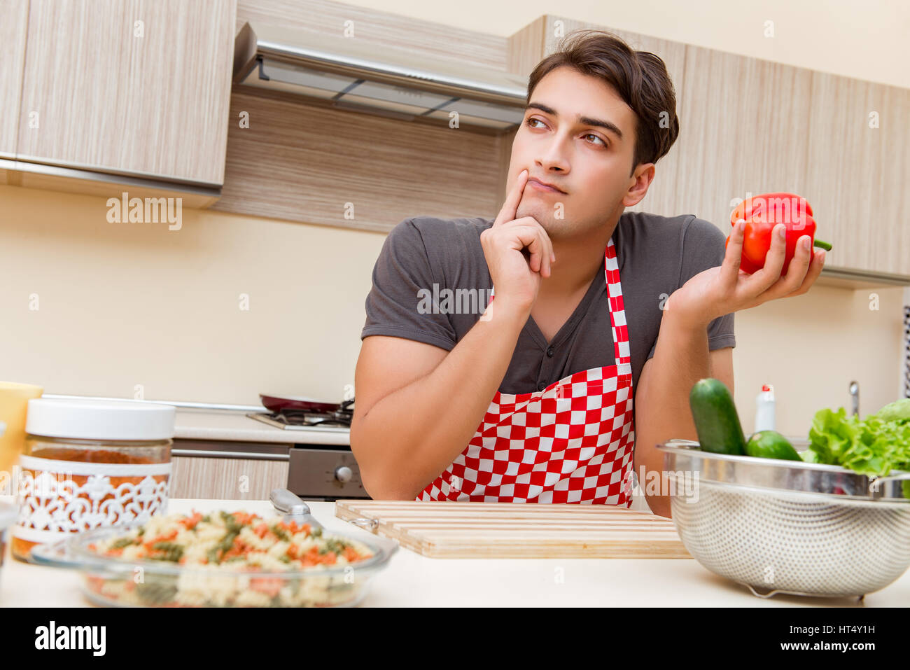 Man male cook preparing food in kitchen Stock Photo - Alamy
