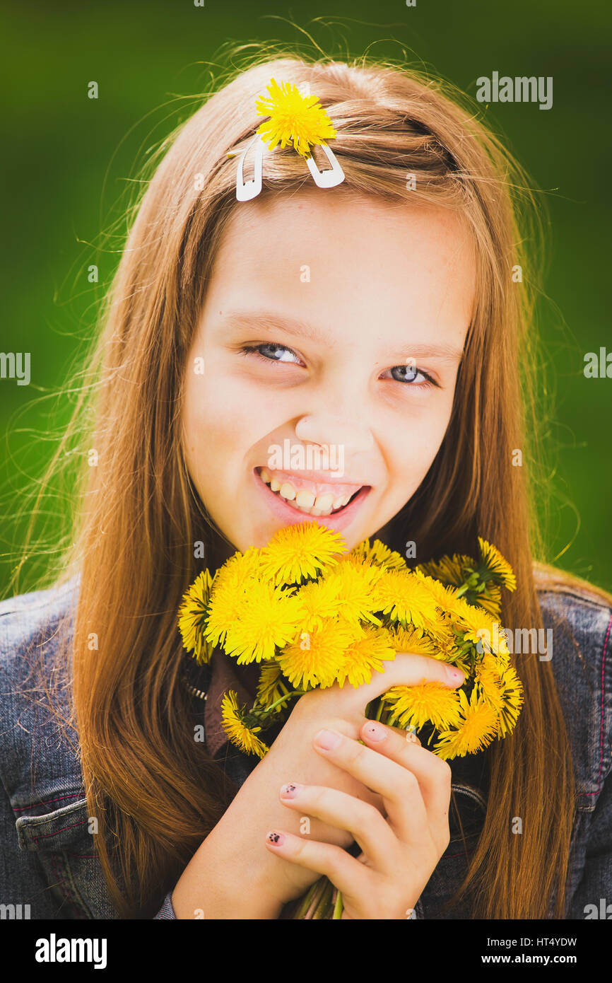 Portrait of spring girl. Closeup of beautiful young smiling girl with ...