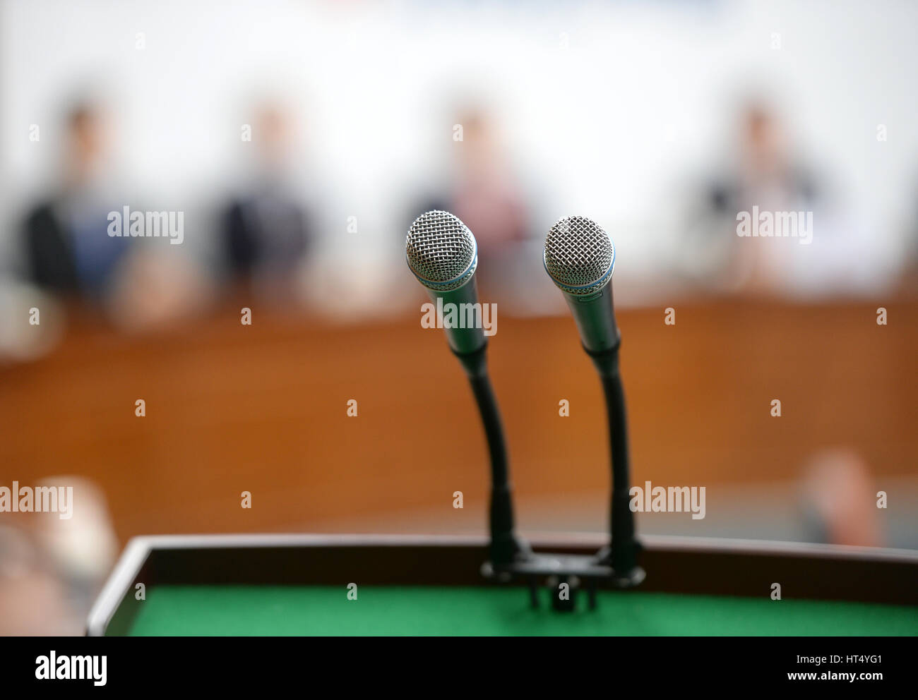Speaking into two microphones hi-res stock photography and images - Alamy