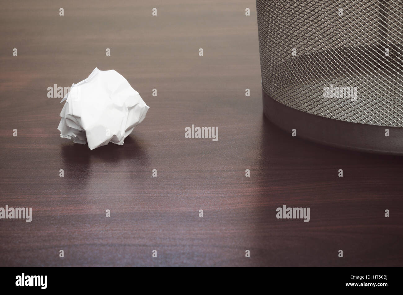 crumpled paper outside the bin Stock Photo - Alamy