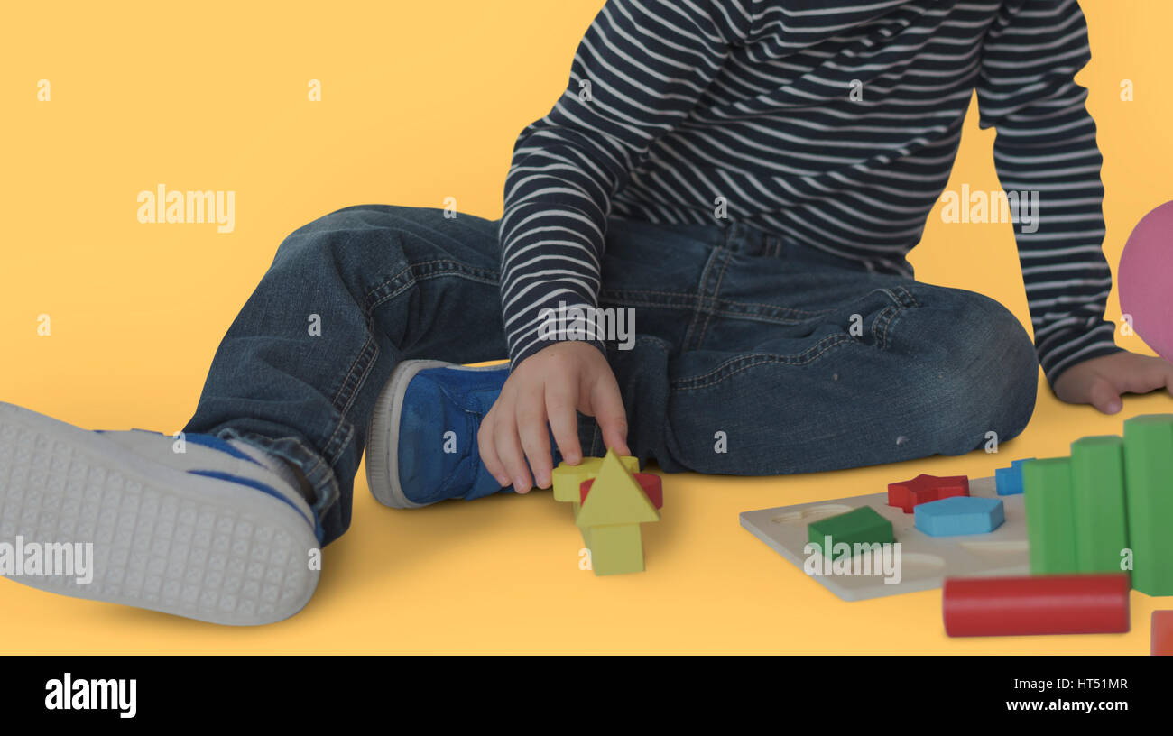 Caucasian Boy Focused Concentrated Play Stock Photo - Alamy