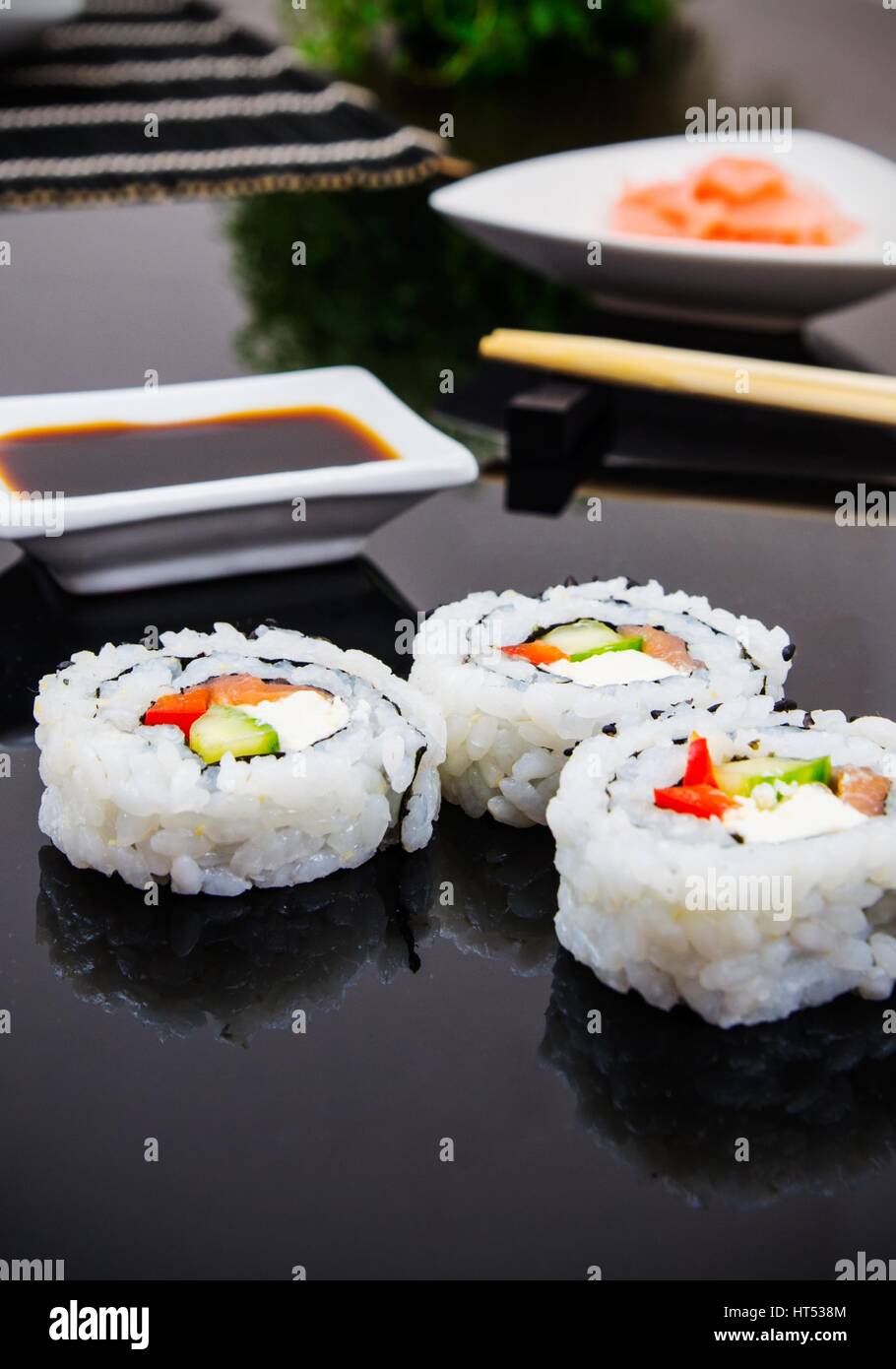Sushi set with sticks and ginger Stock Photo - Alamy
