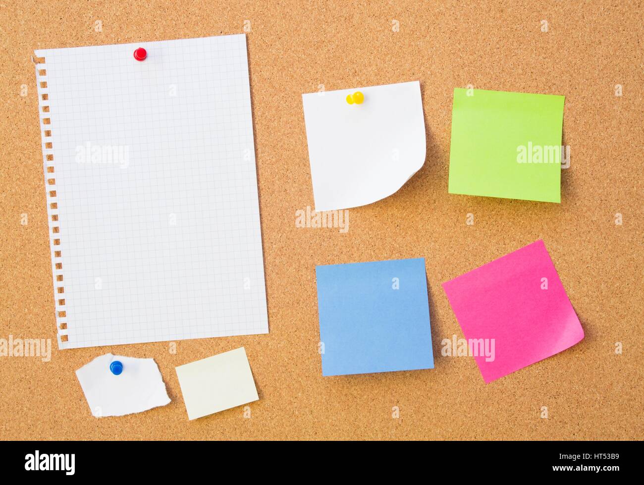 Colour note papers on pin board. Cork background Stock Photo - Alamy