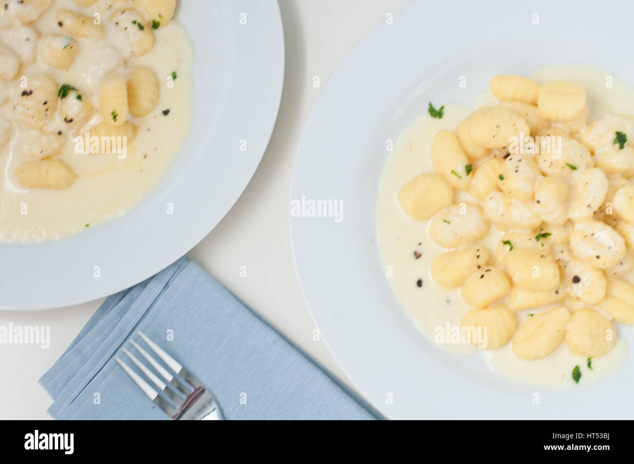 potato gnocchi with fontina cream,italy Stock Photo - Alamy