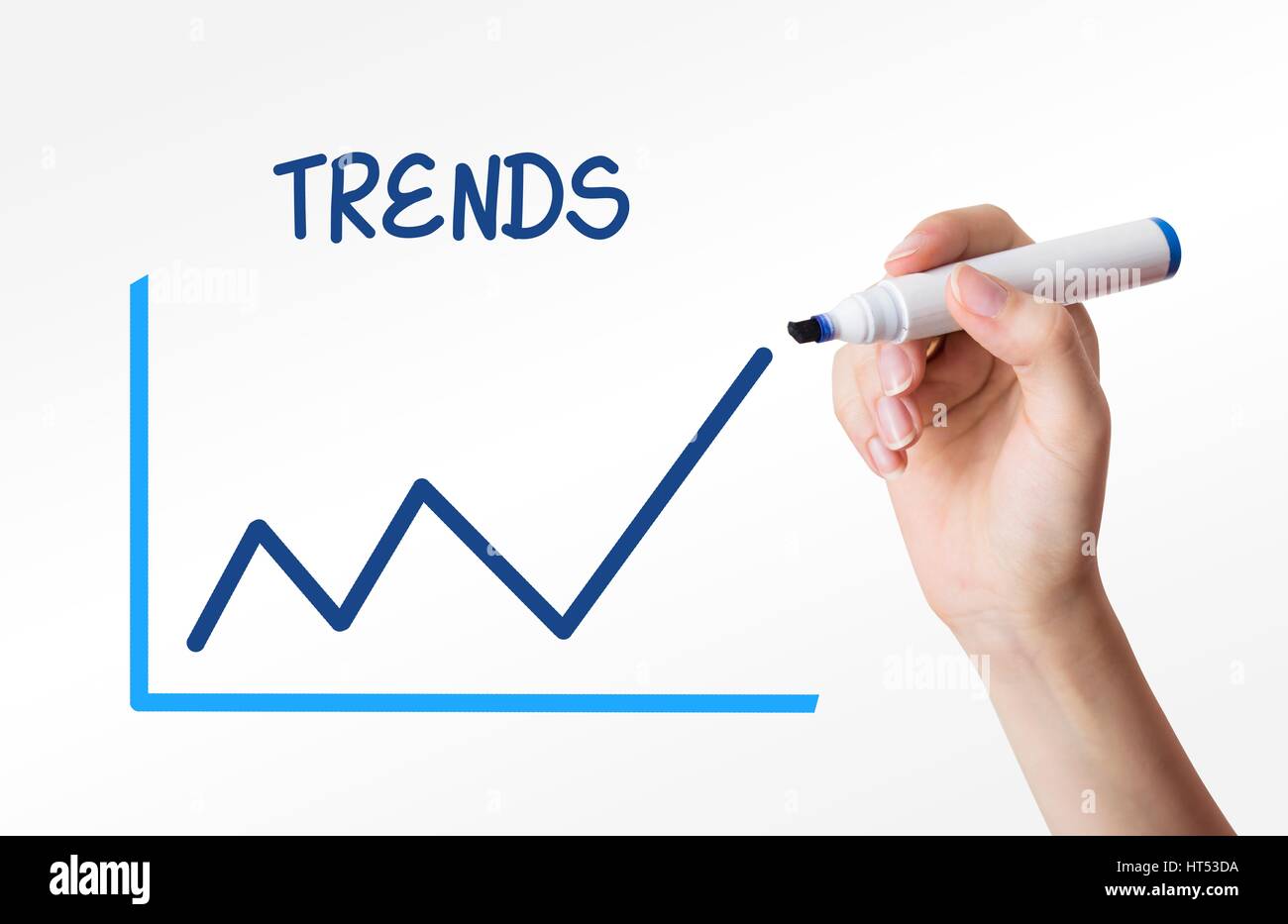 Hand drawing a trends graph on a virtual screen Stock Photo - Alamy