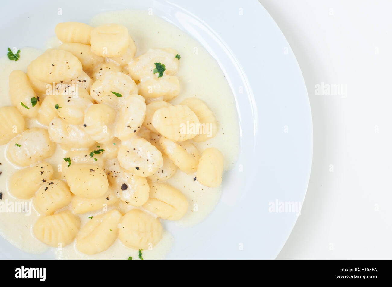 potato gnocchi with fontina cream,italy Stock Photo - Alamy