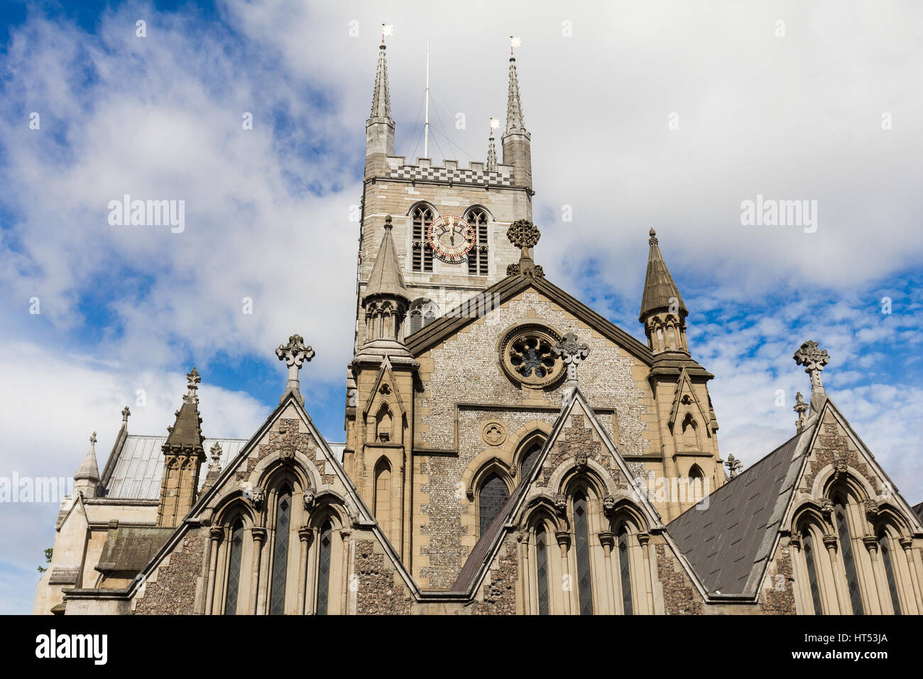 Medieval era christian church tower with a cloudy sky for the ...
