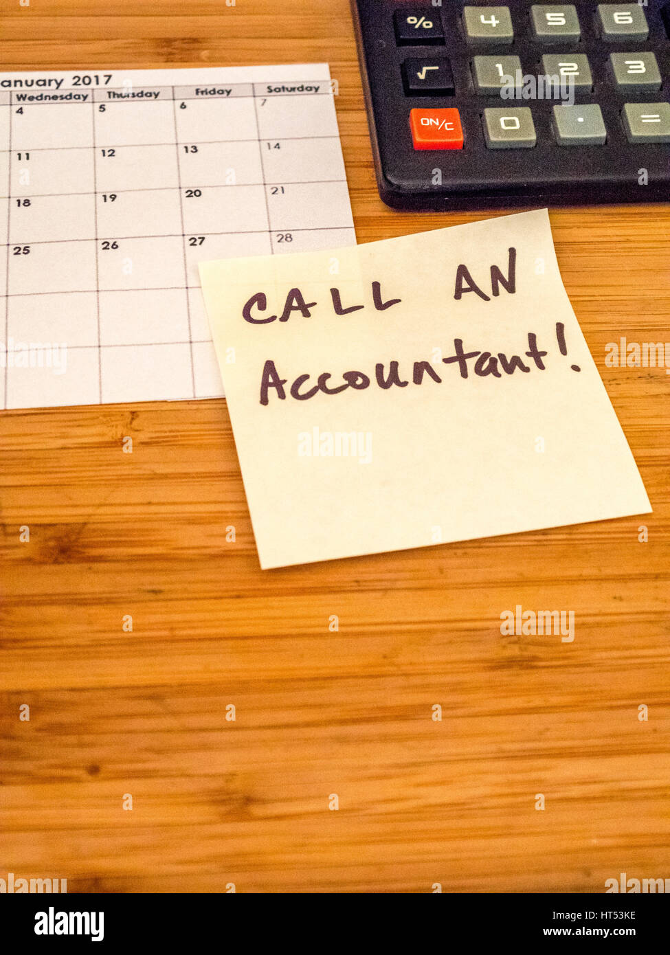 calendar, calculator, post it, tax work Stock Photo - Alamy