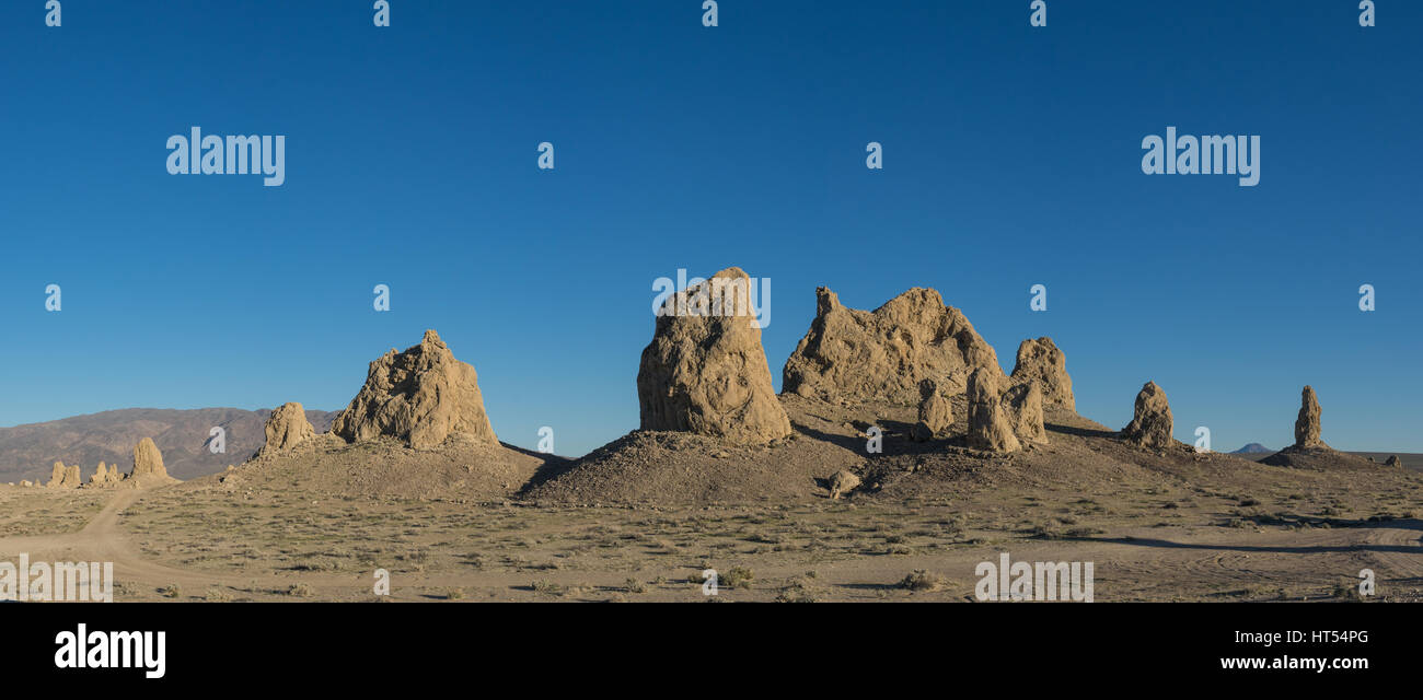 Large pinnacles of rock form geological structures in the desert of ...