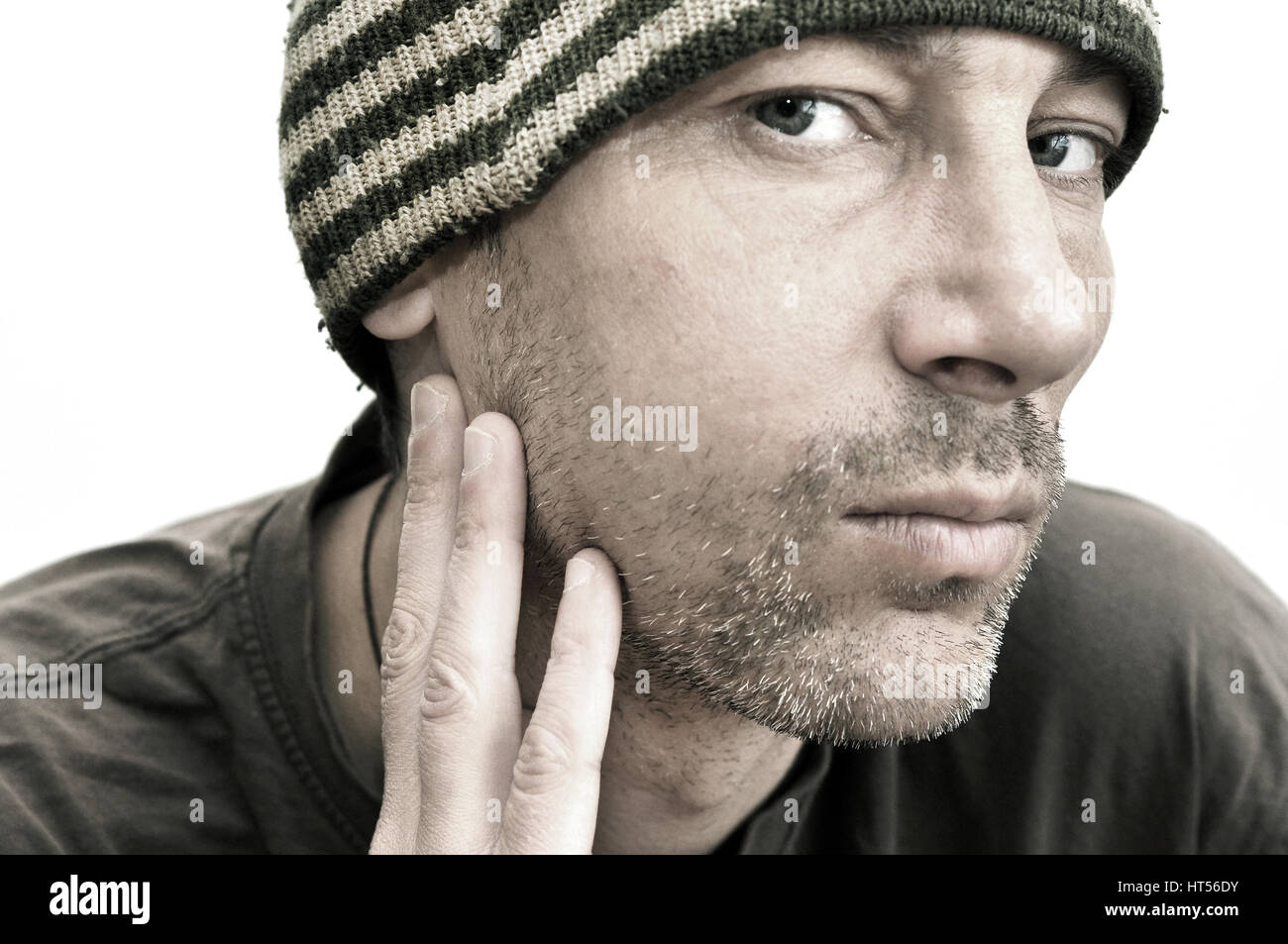 Man with swollen face suffering from toothache Stock Photo - Alamy
