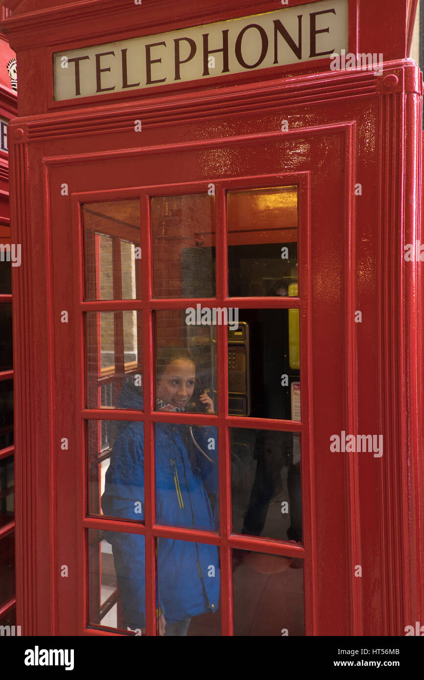 London telephone box girl hi-res stock photography and images - Alamy