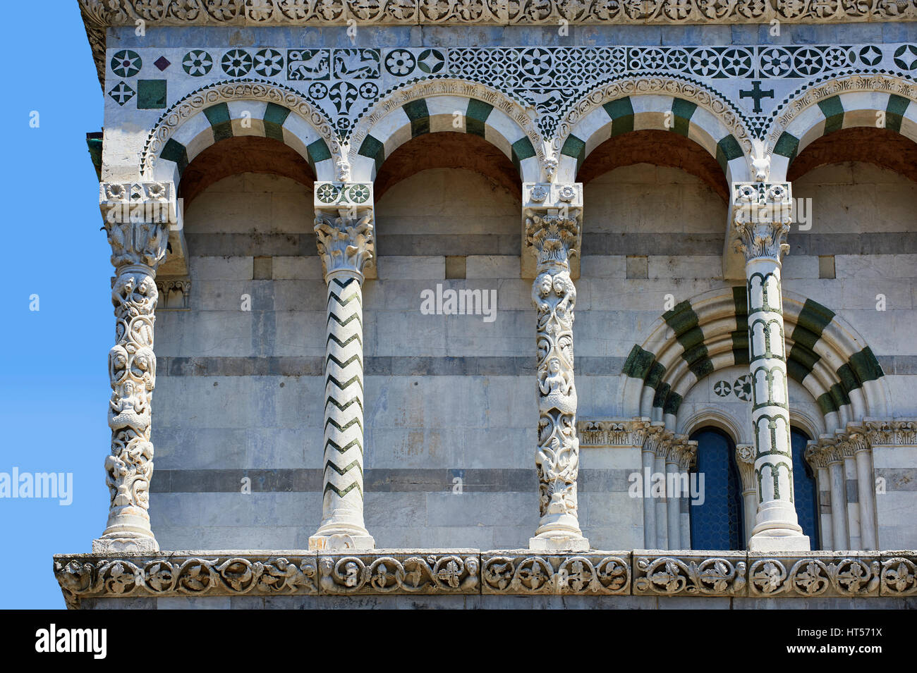 13th century Romaesque arcade pillars, sculptures and inlaid depictions ...