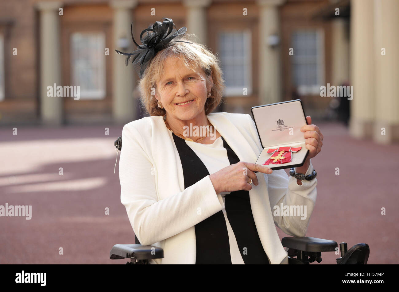 Anne Dunham after she was awarded a OBE by Queen Elizabeth II for ...