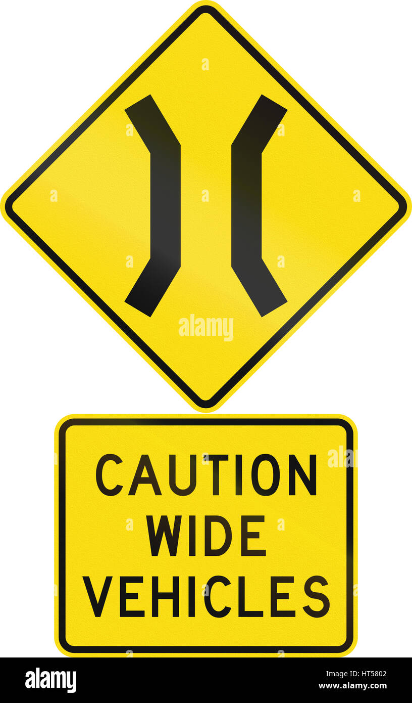 Road sign assembly in New Zealand - Caution wide vehicles Stock Photo ...