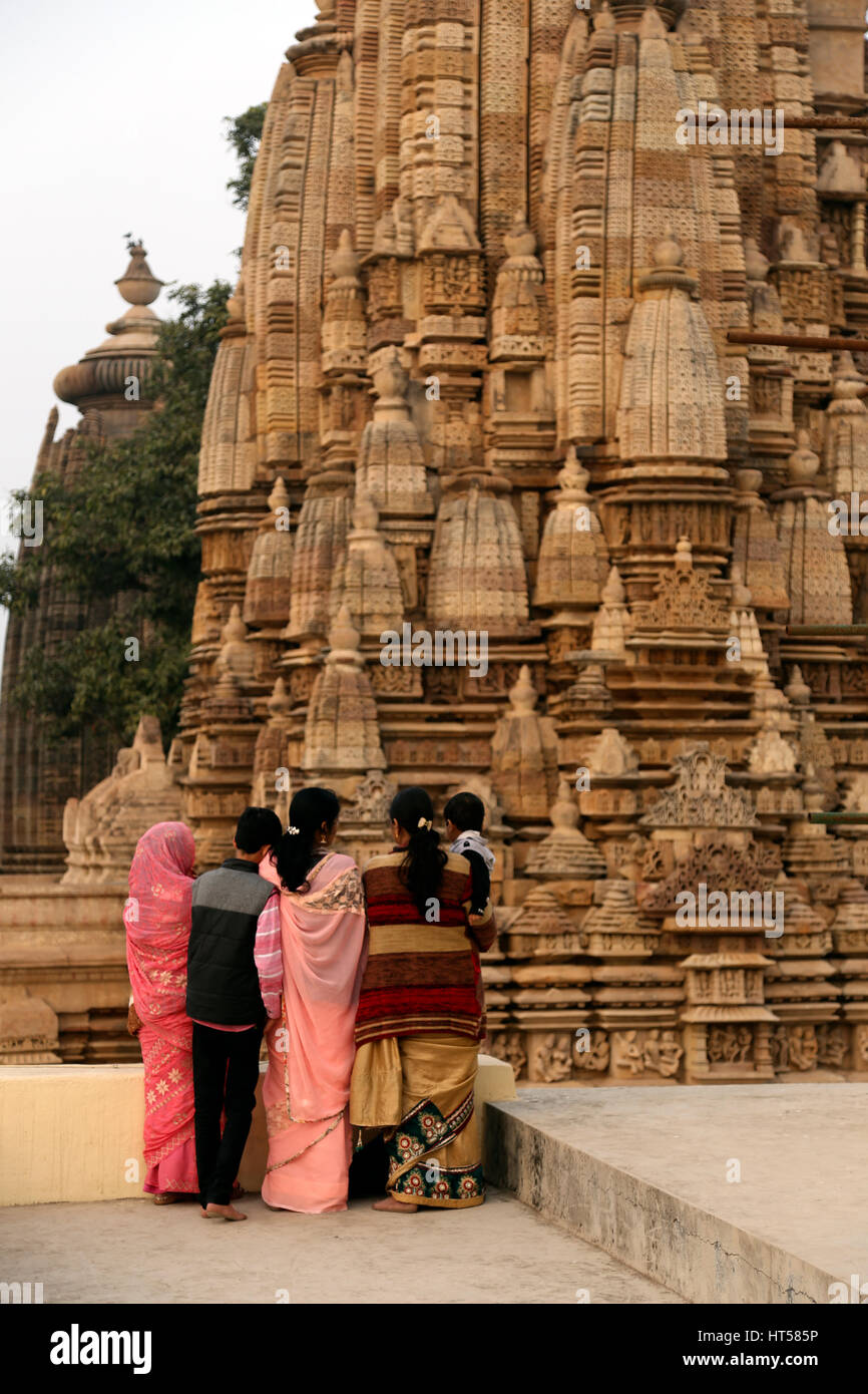 group of women looking the temple of Parshvanath temple, Khajuraho ...