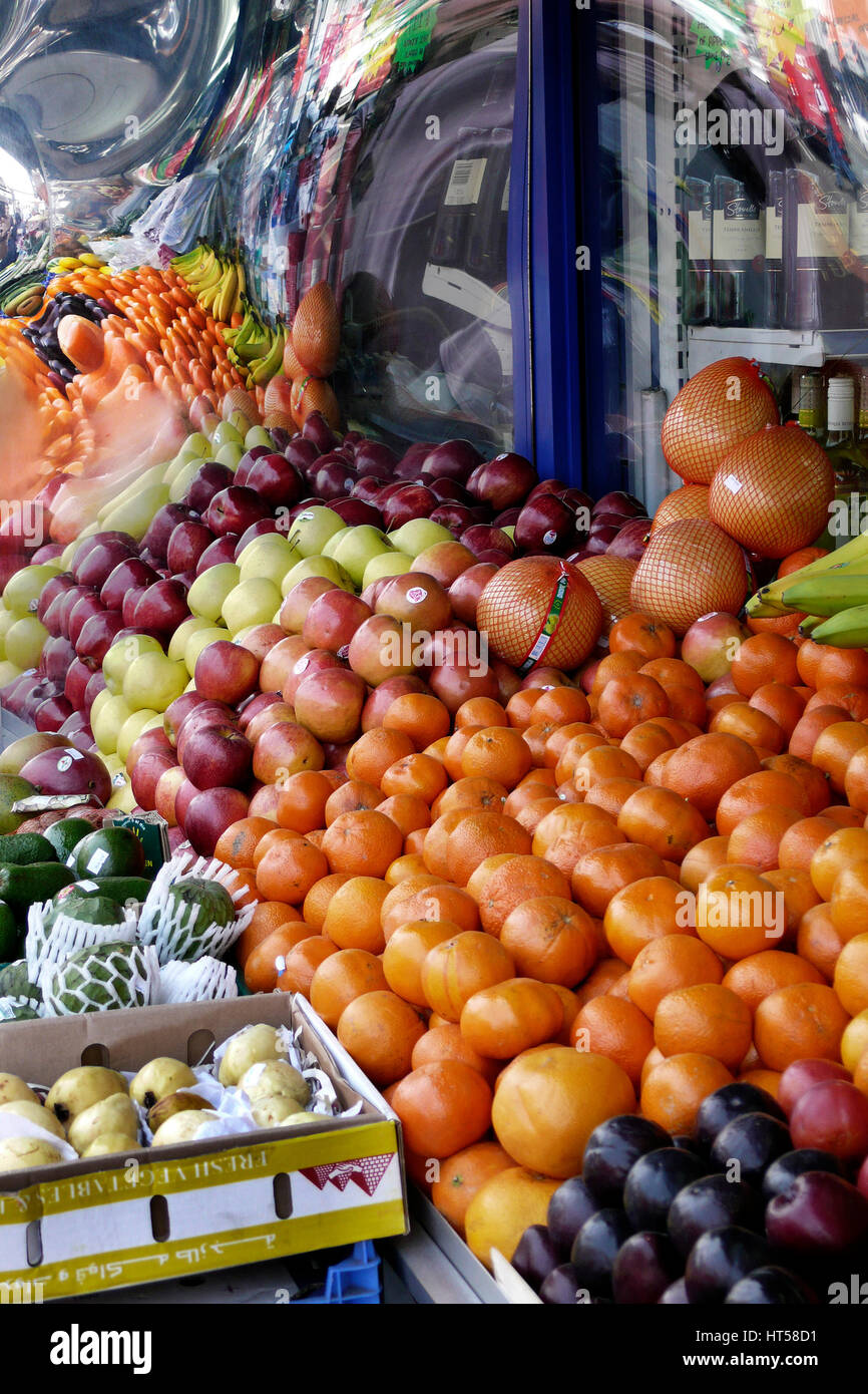 kentish town shop with outside fruit stall oranges and apples peaches ...